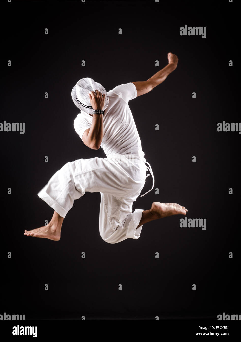 Dancer dancing dances in white clothing Stock Photo - Alamy