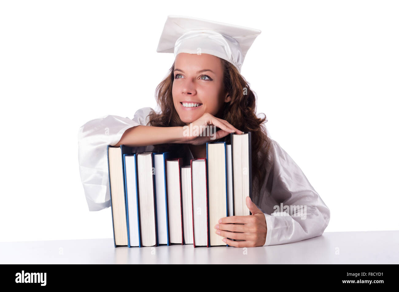 Graduate with book isolated on white Stock Photo - Alamy