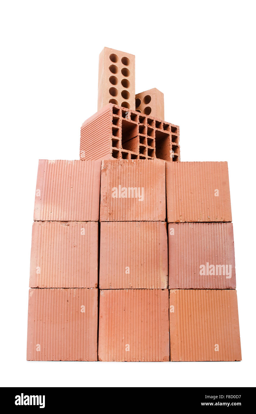 Stack of clay bricks isolated on white Stock Photo - Alamy