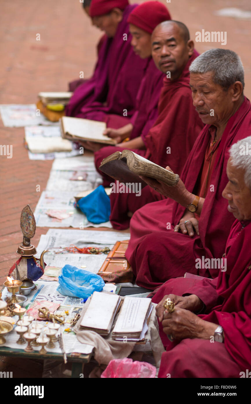 Buddhist monks praying in temple hi-res stock photography and images ...