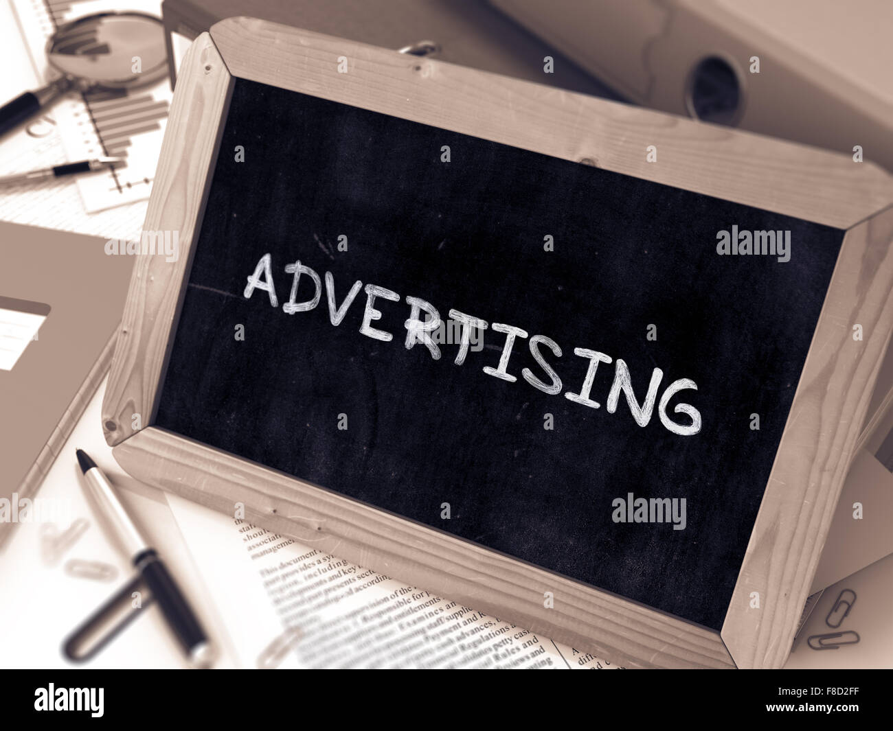 Hand Drawn Advertising Concept on Small Chalkboard Stock Photo - Alamy