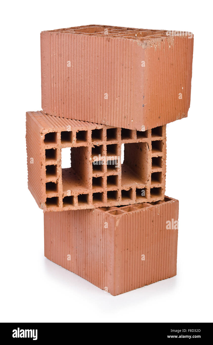 Stack of clay bricks isolated on white Stock Photo - Alamy