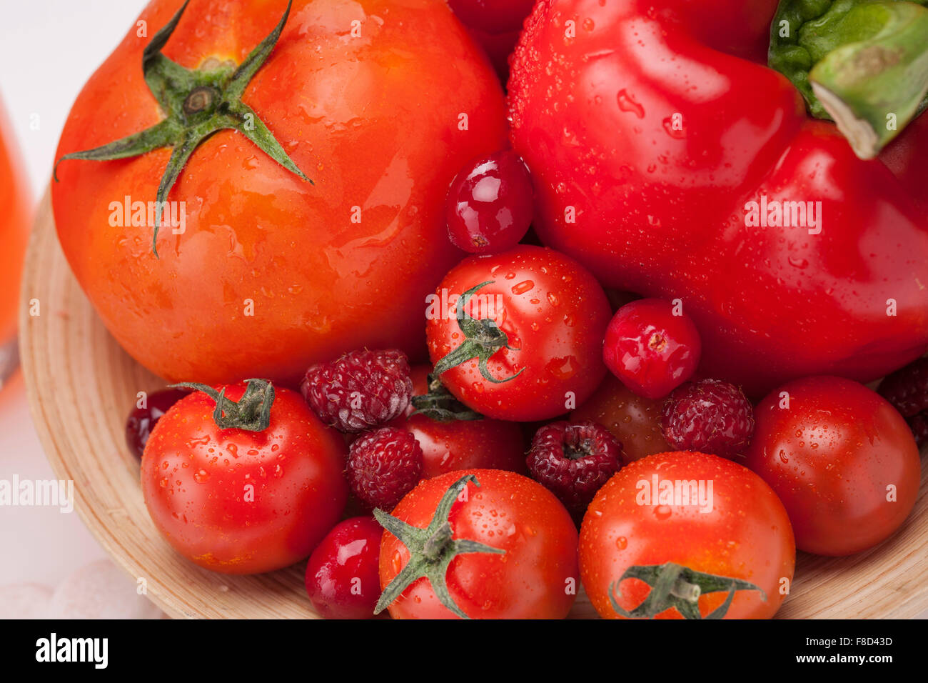 High angle of close-up of combination of red color fruits and ...