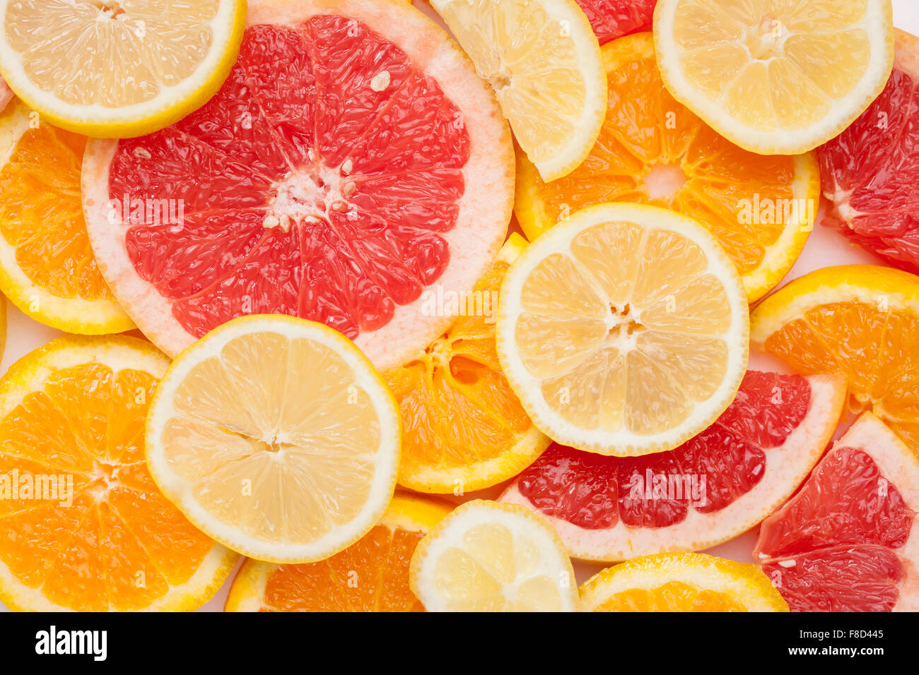 Combination of slices of grapefruit, lemon, and orange Stock Photo - Alamy