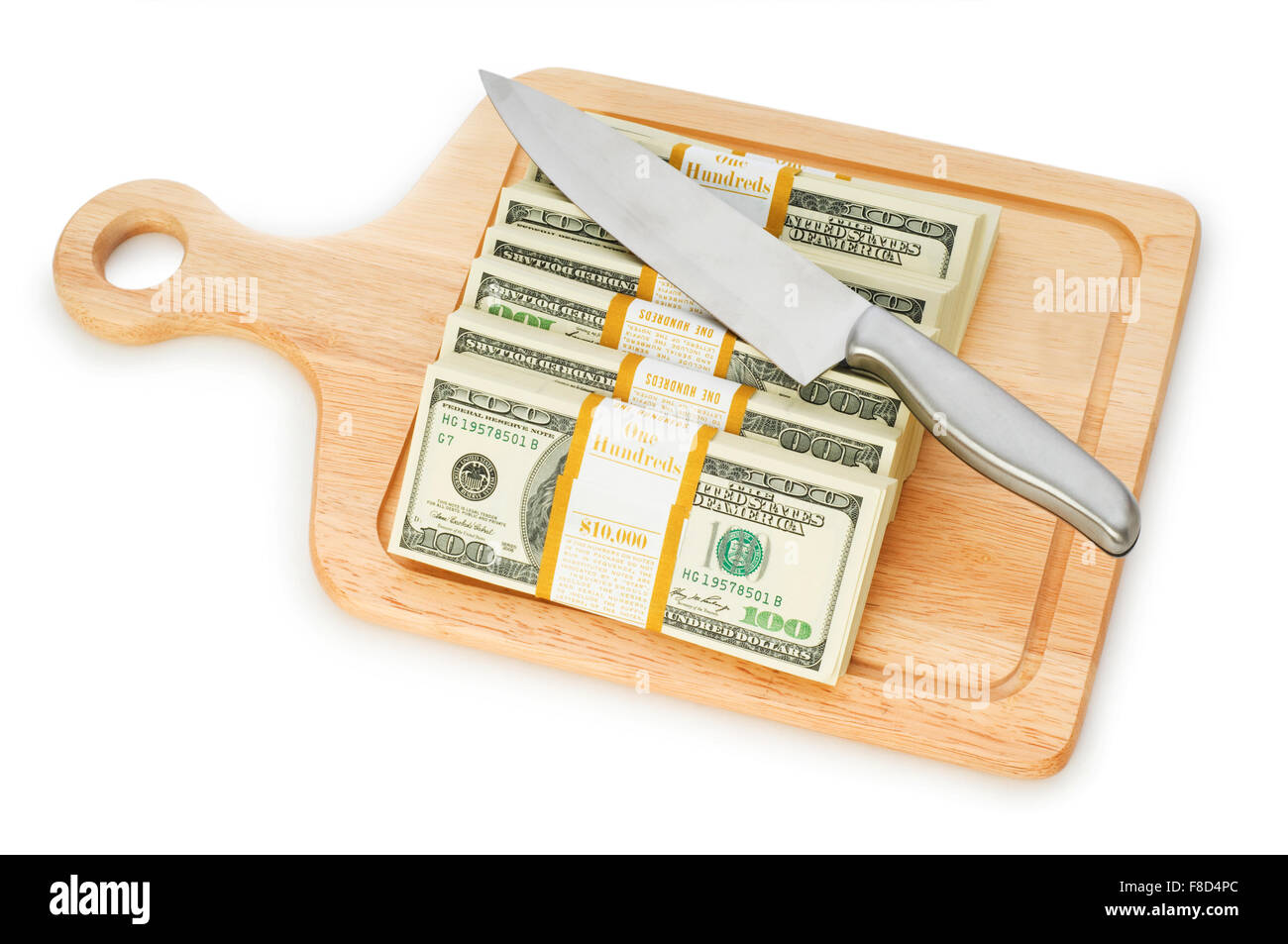 Money concept - cutting dollars with the knife Stock Photo - Alamy