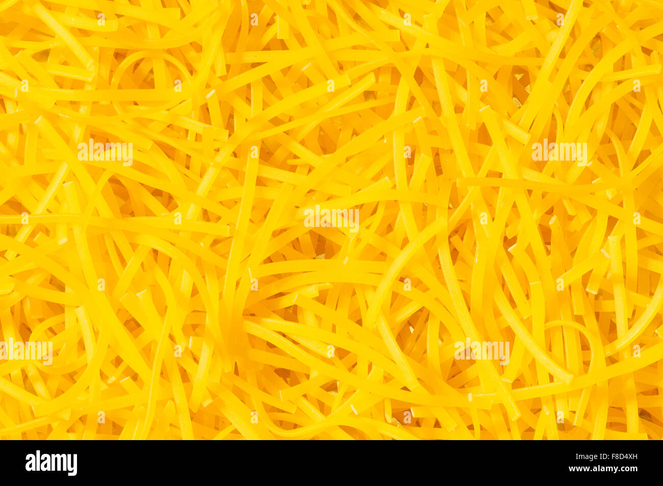 Extreme close up of yellow italian pasta Stock Photo - Alamy