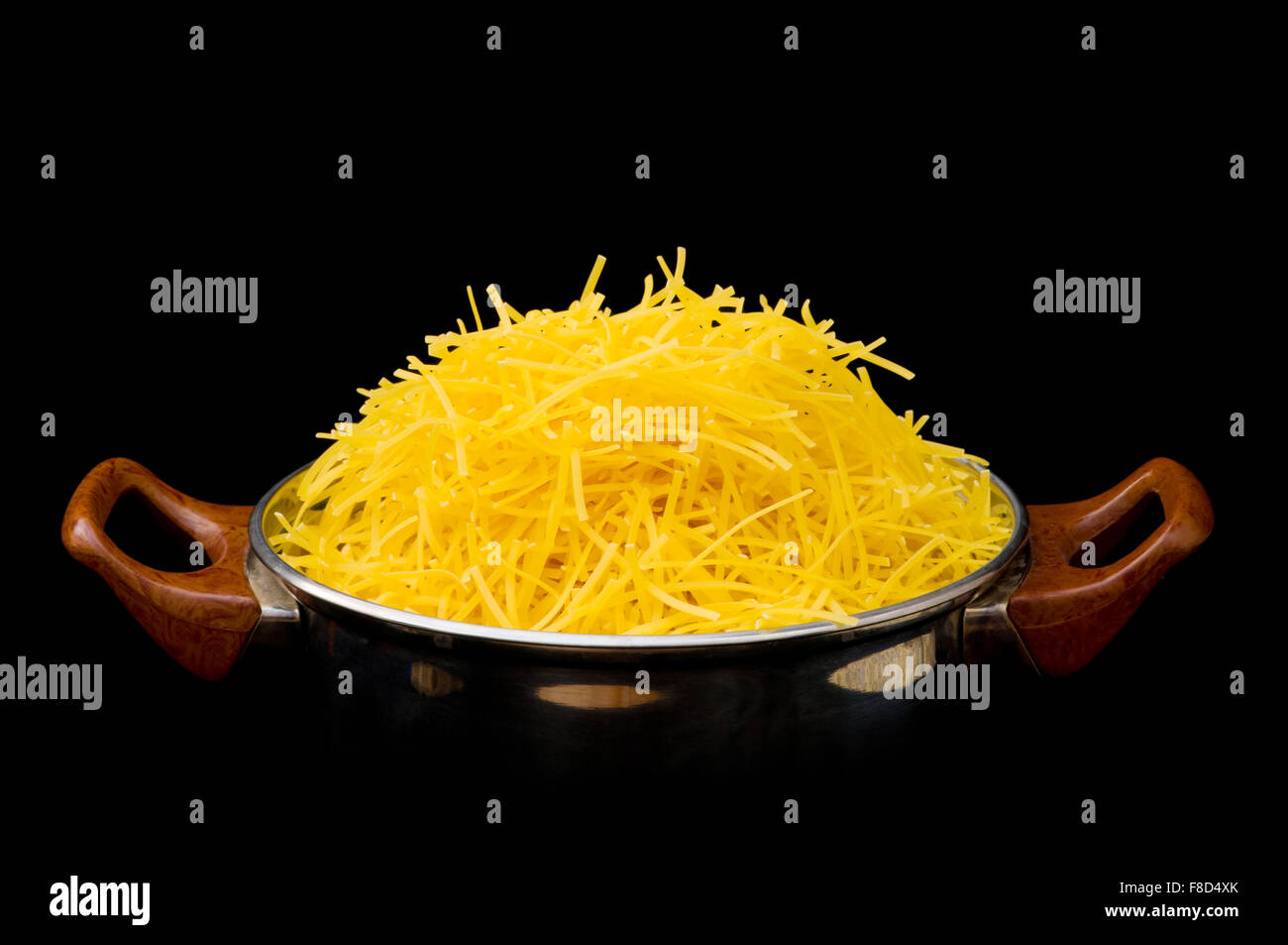 Spaghetti pot isolated on the black background Stock Photo - Alamy