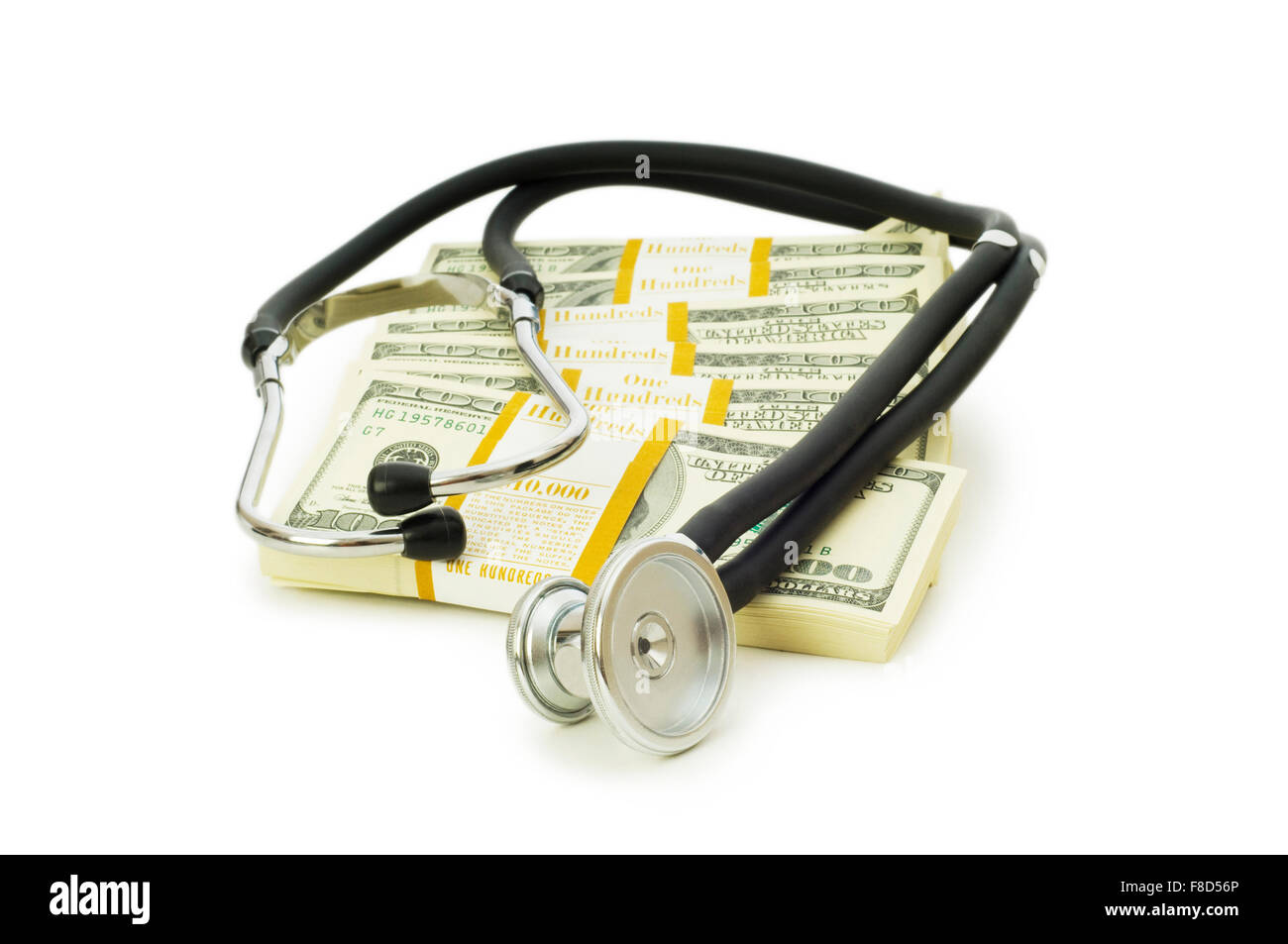 Concept Of Expensive Healthcare With Dollars And Stethoscope Stock