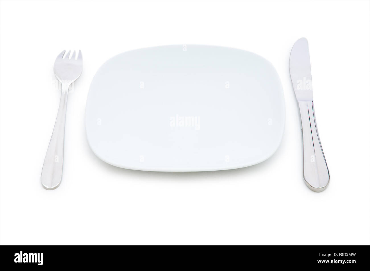 Set of table utensils isolated on white Stock Photo - Alamy