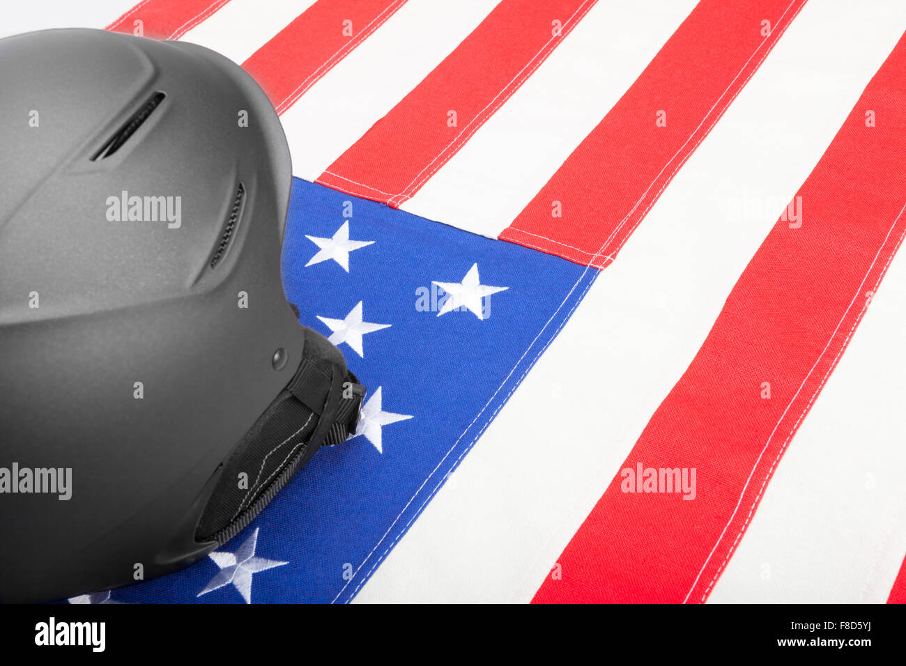 Helmet over USA flag as symbol of active life style Stock Photo - Alamy