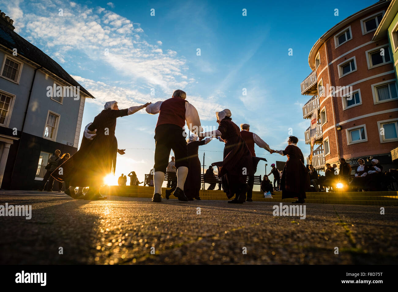 A group of people in traditional costume folk dancing on Aberystwyth ...