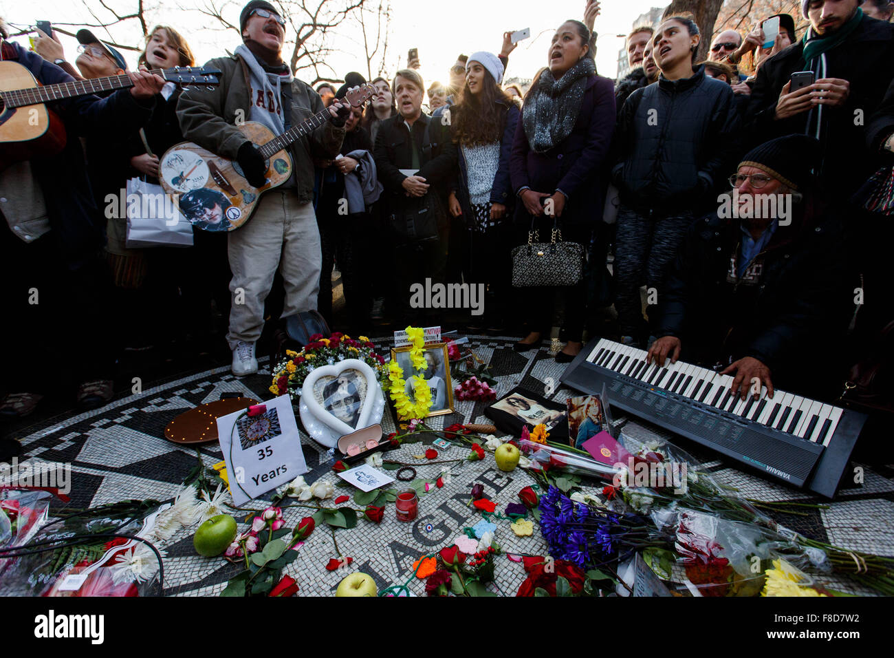 New York. 8th Dec, 1980. Crowds gathered in Central Park's Strawberry ...