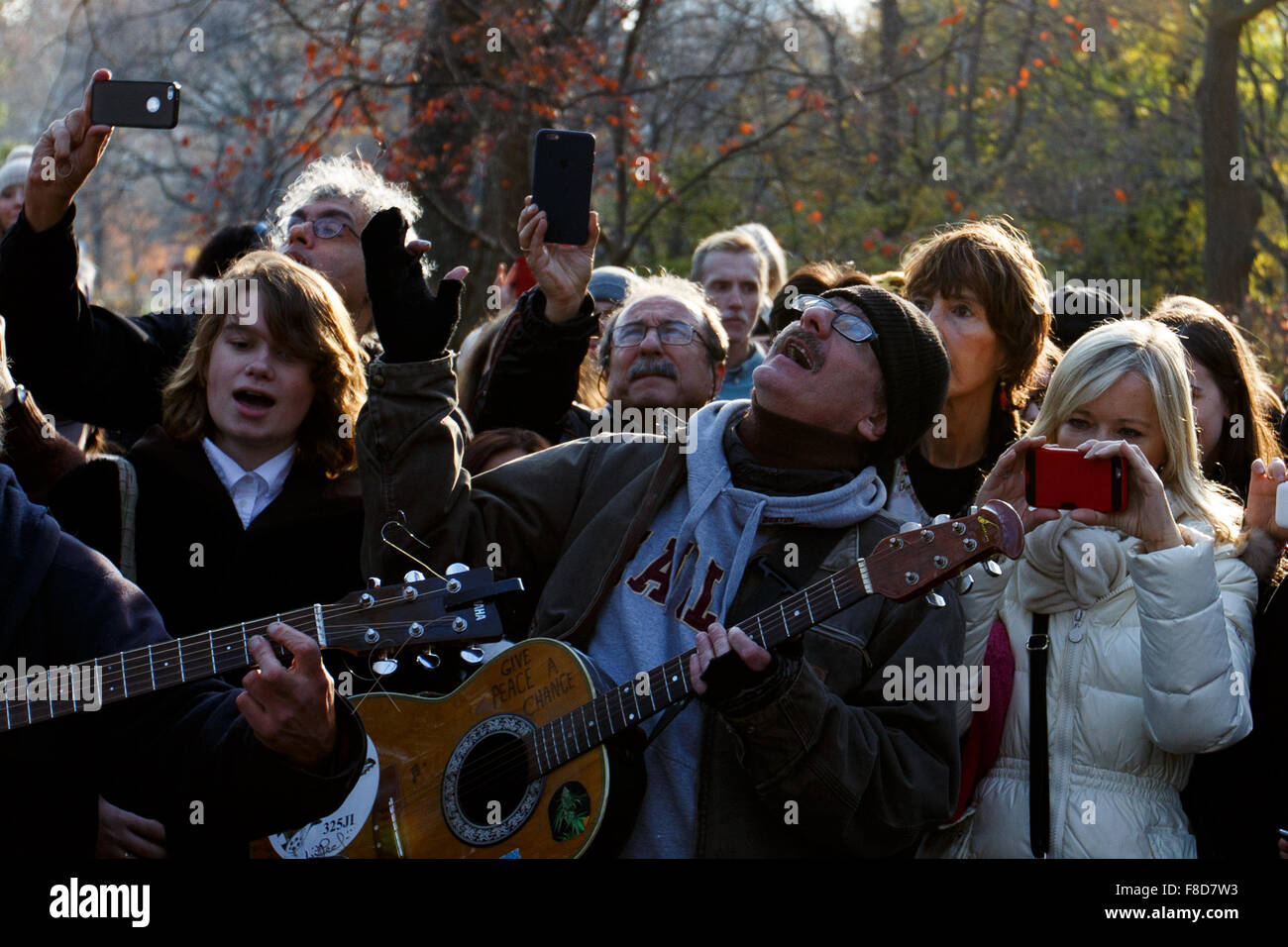 New York. 8th Dec, 1980. Crowds gathered in Central Park's Strawberry ...