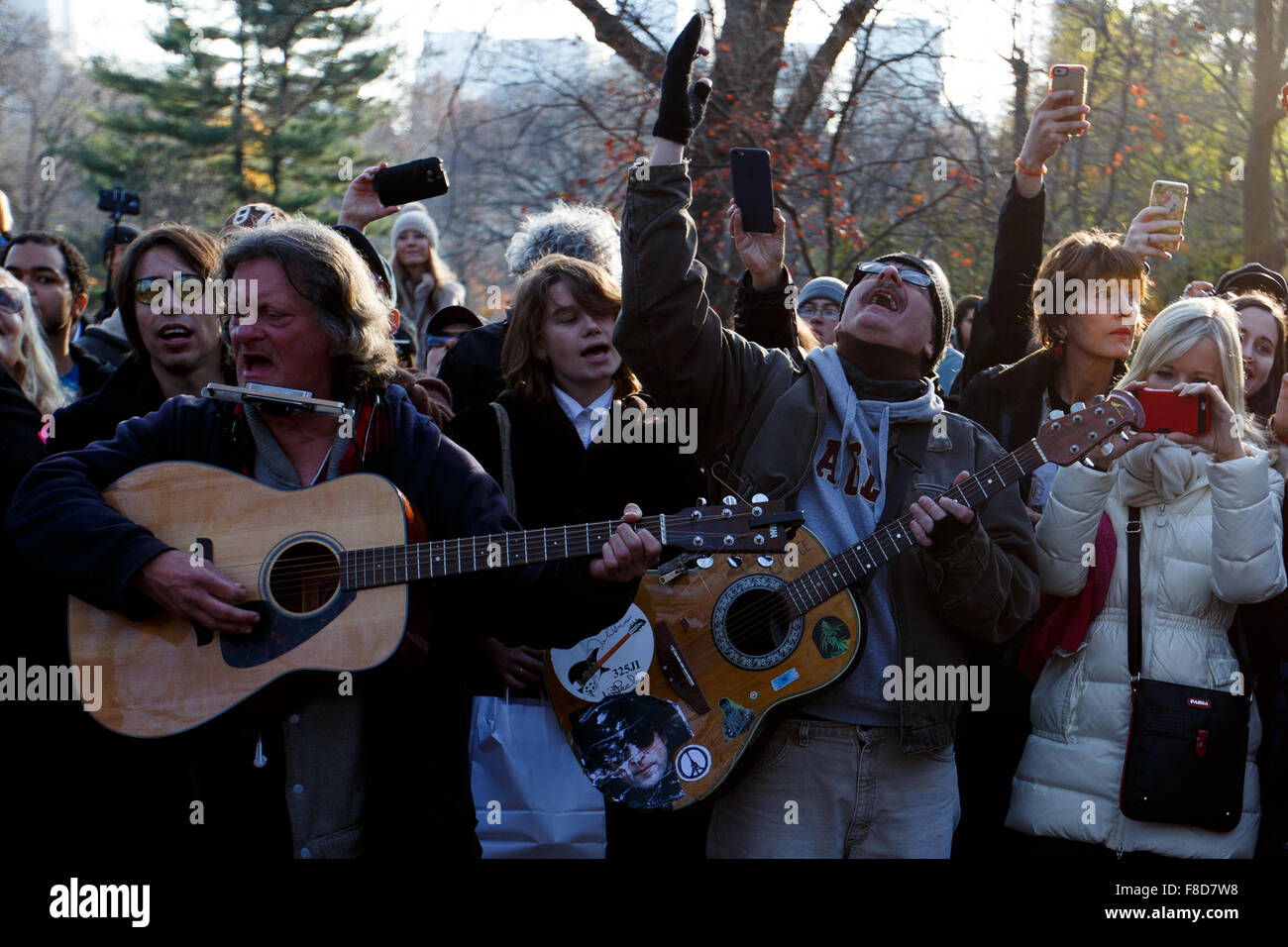 New York. 8th Dec, 1980. Crowds gathered in Central Park's Strawberry ...