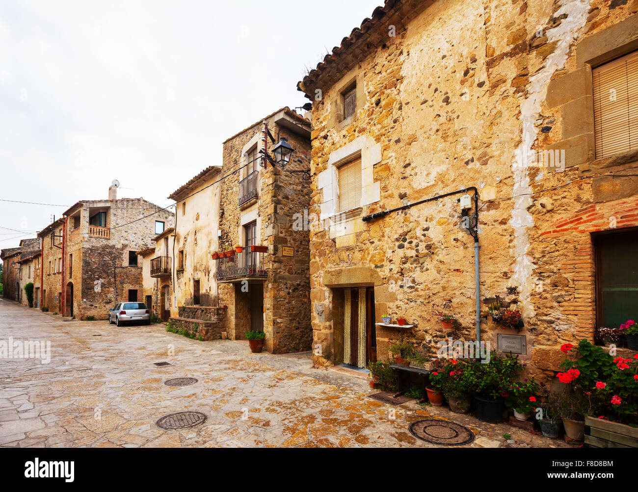 Old street in Catalan town. Pubol, Spain Stock Photo - Alamy