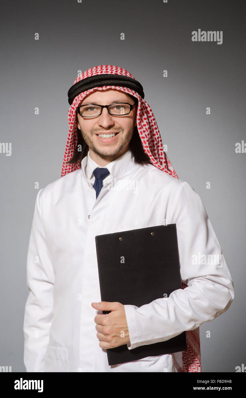 Arab man with paper binder Stock Photo - Alamy