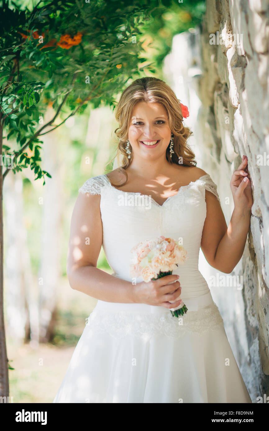 Bride alone happy outdoors hi-res stock photography and images - Alamy