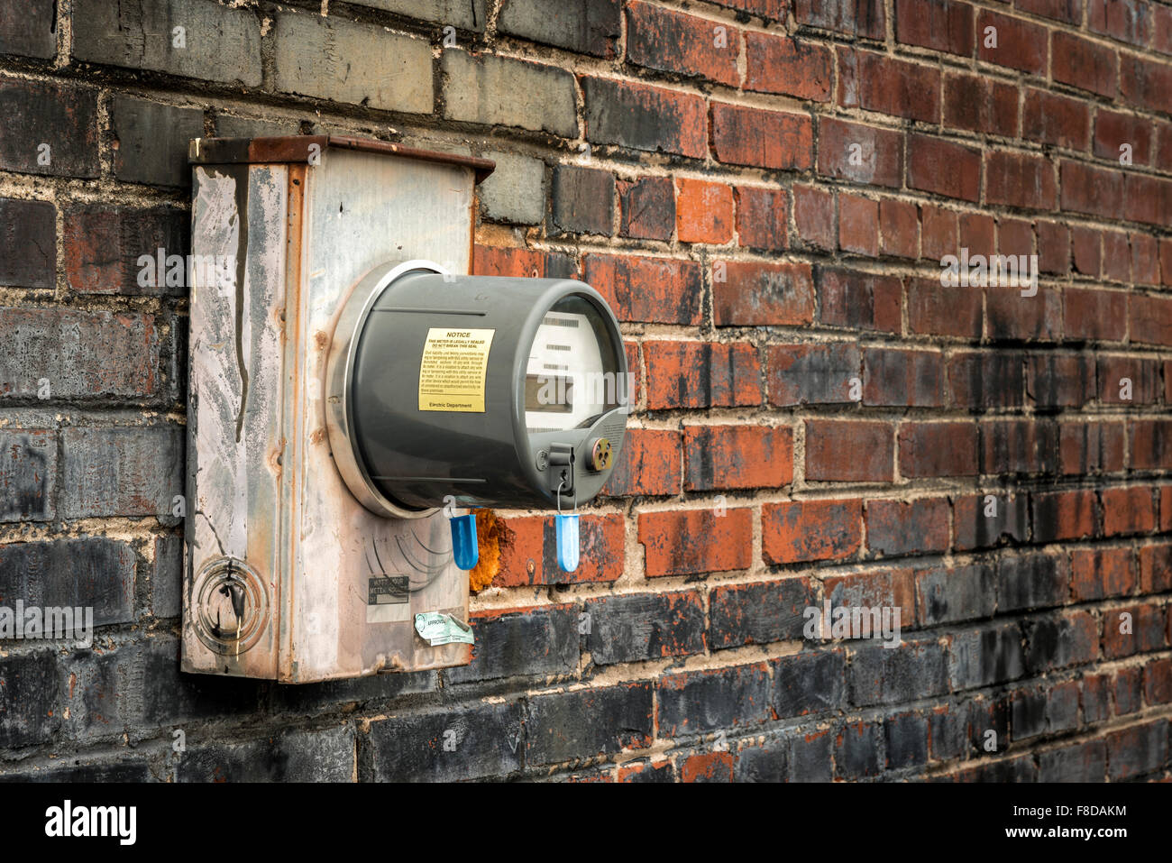 Electric Meter On Old Brick Wall of Commercial Building Stock Photo - Alamy