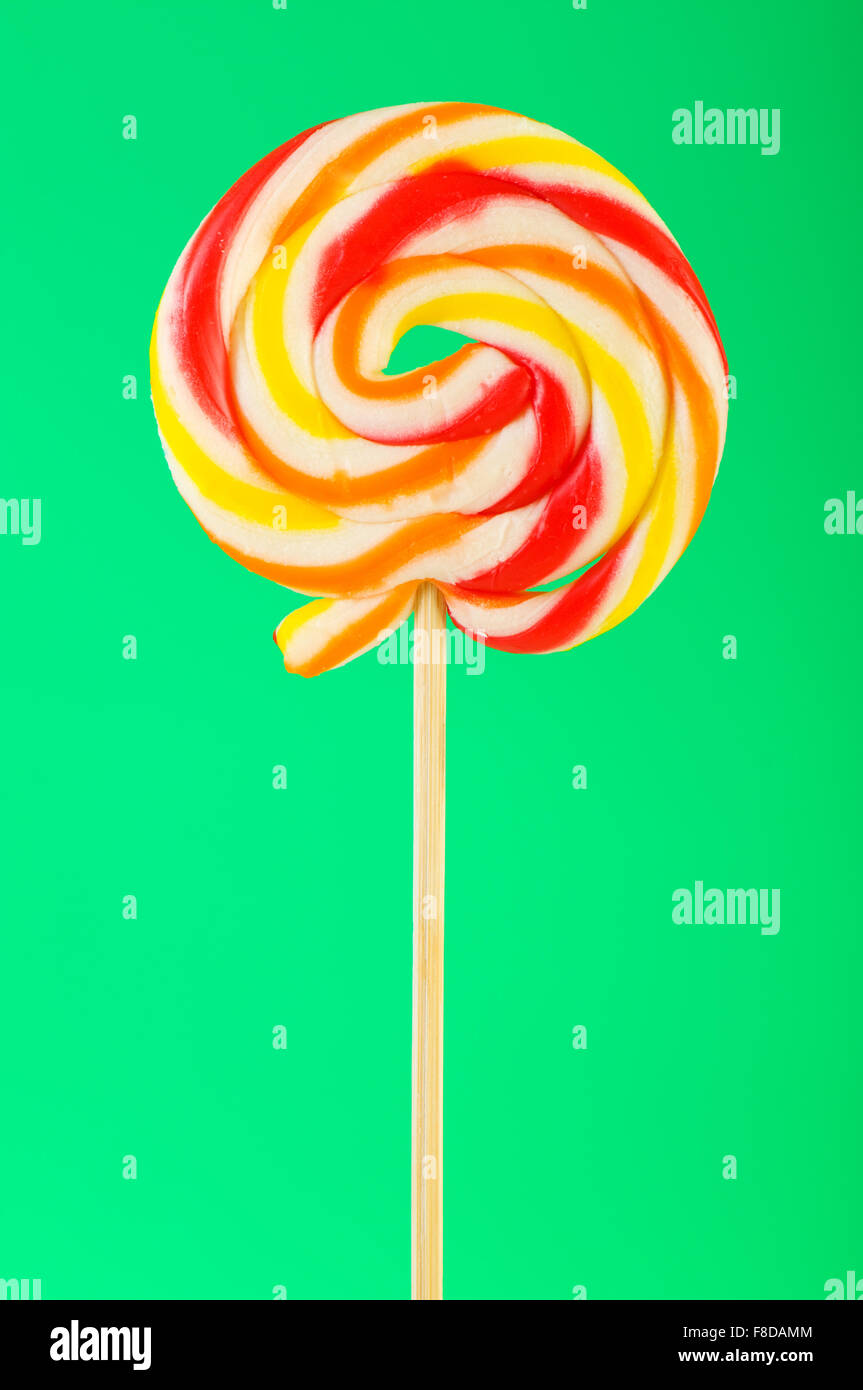 Colourful lollipop against the colourful background Stock Photo - Alamy