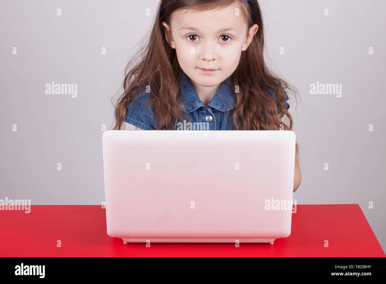 girl child with computer Stock Photo - Alamy