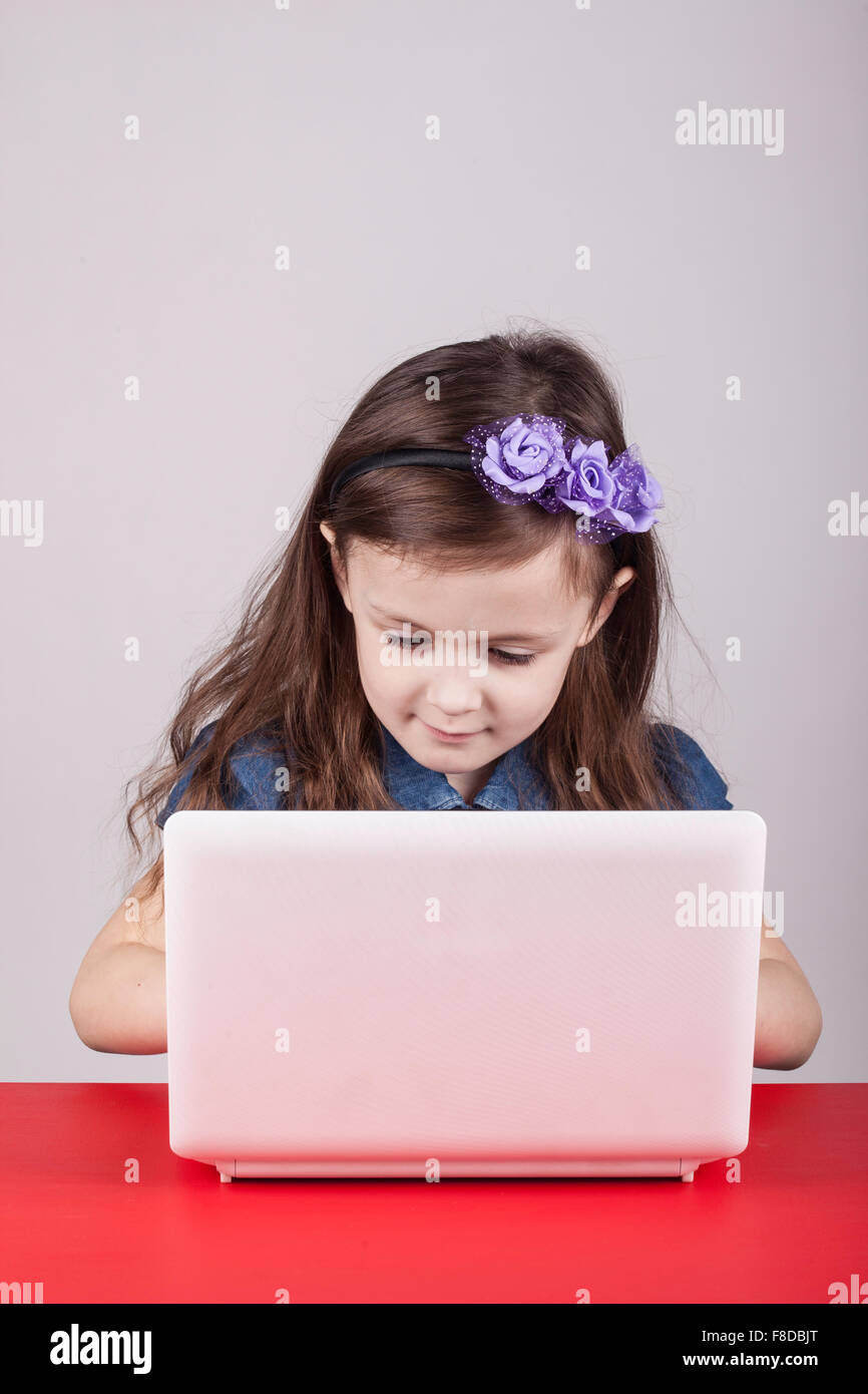 girl child with computer Stock Photo - Alamy