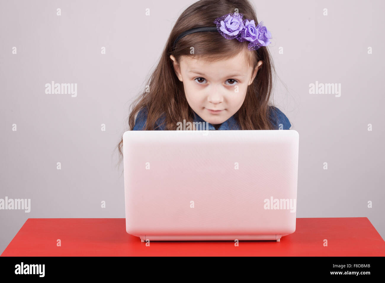 girl child with computer Stock Photo - Alamy