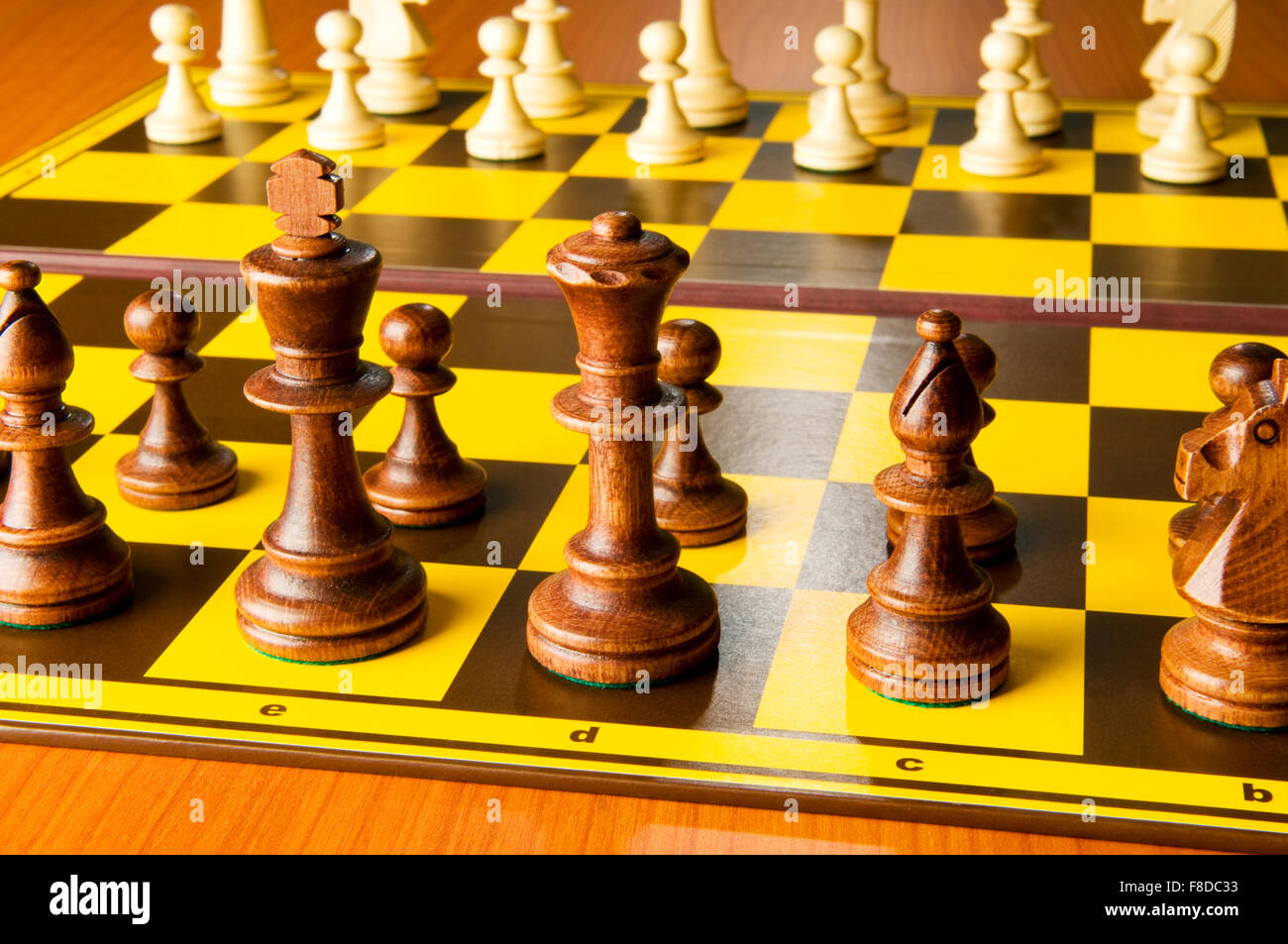 Set of chess figures on the playing board Stock Photo - Alamy