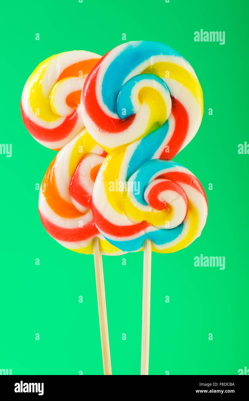 Colourful lollipop against the colourful background Stock Photo - Alamy