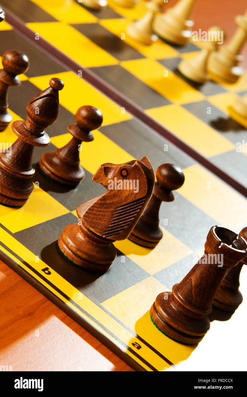 Set of chess figures on the playing board Stock Photo - Alamy