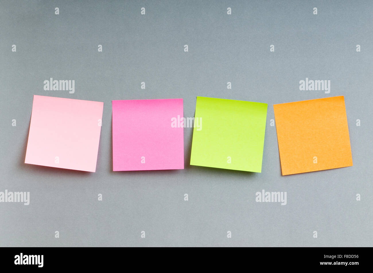 Reminder notes on the bright colorful paper Stock Photo - Alamy