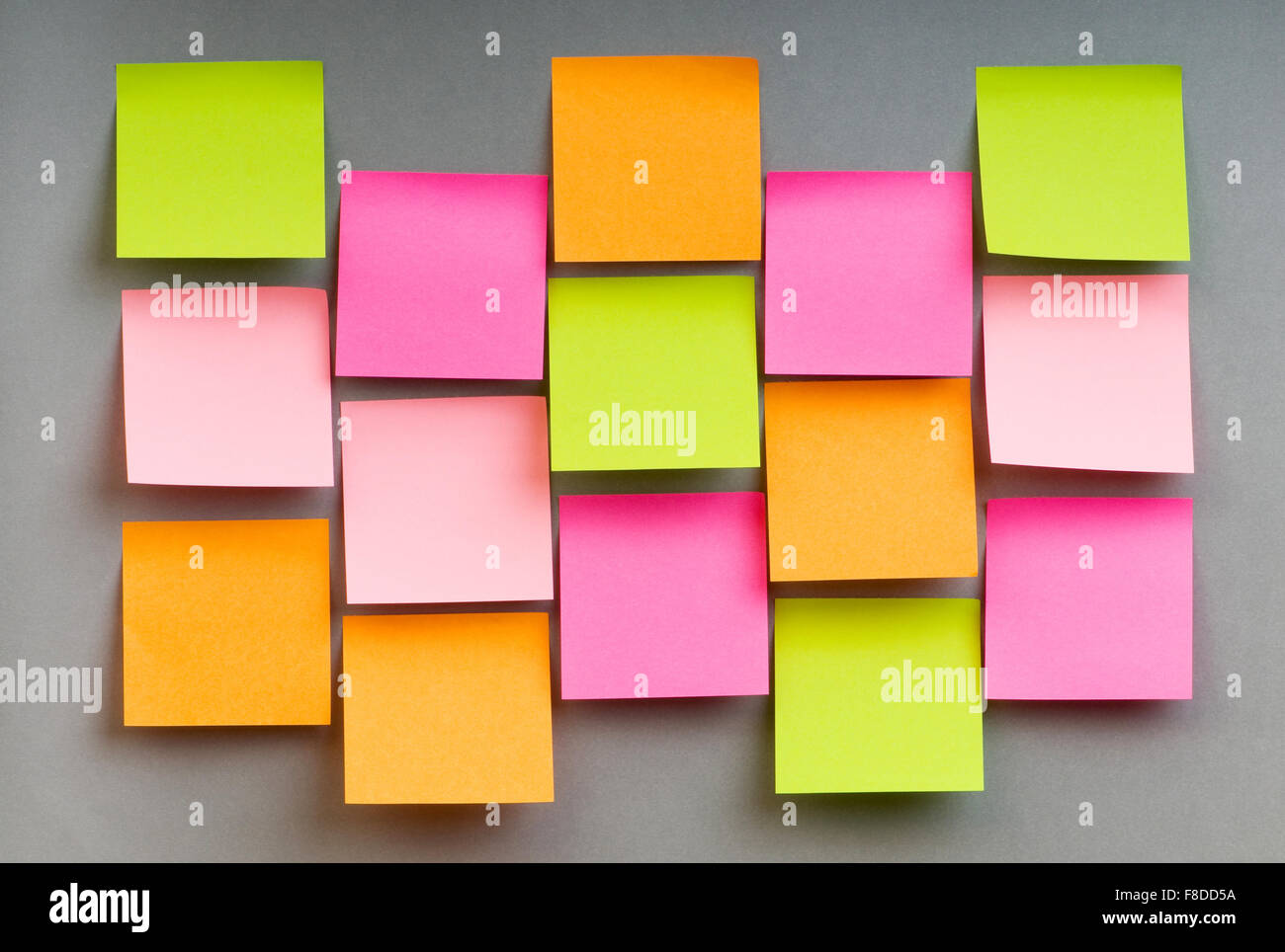 Reminder notes on the bright colorful paper Stock Photo - Alamy