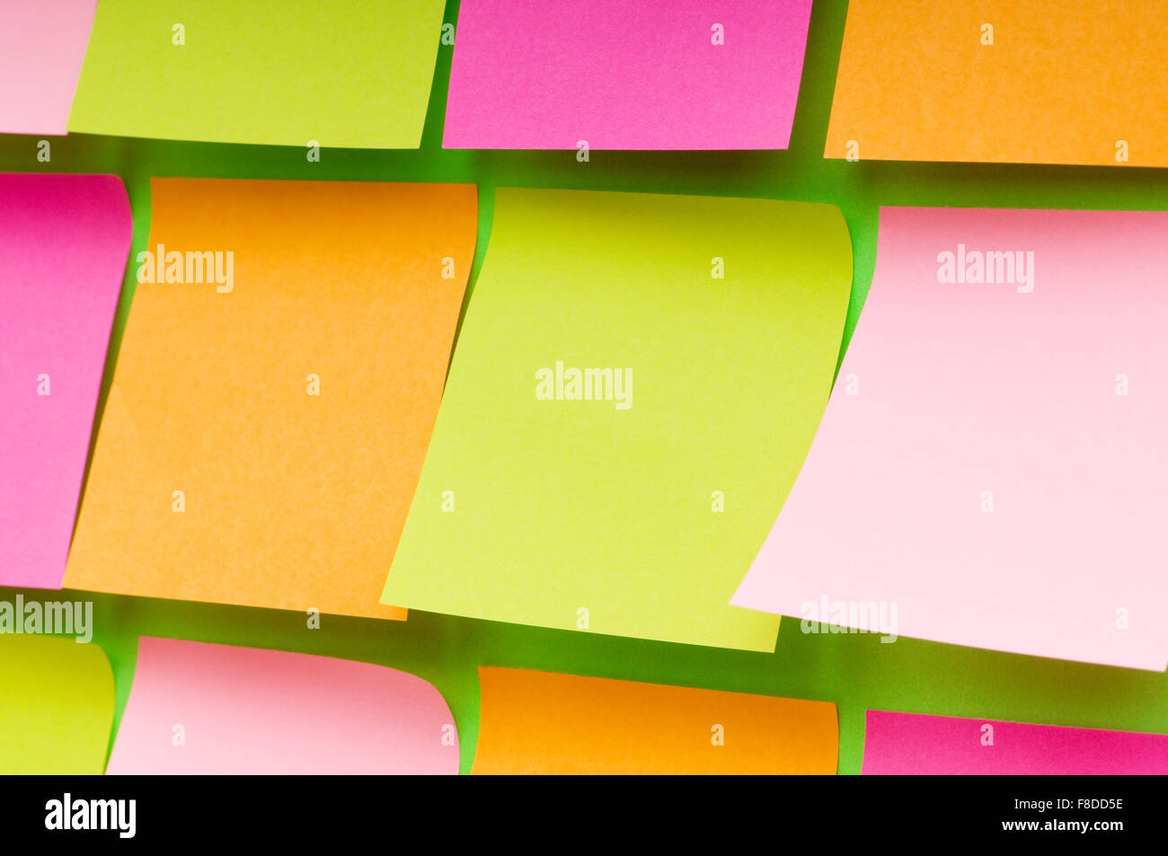 Reminder notes on the bright colorful paper Stock Photo - Alamy