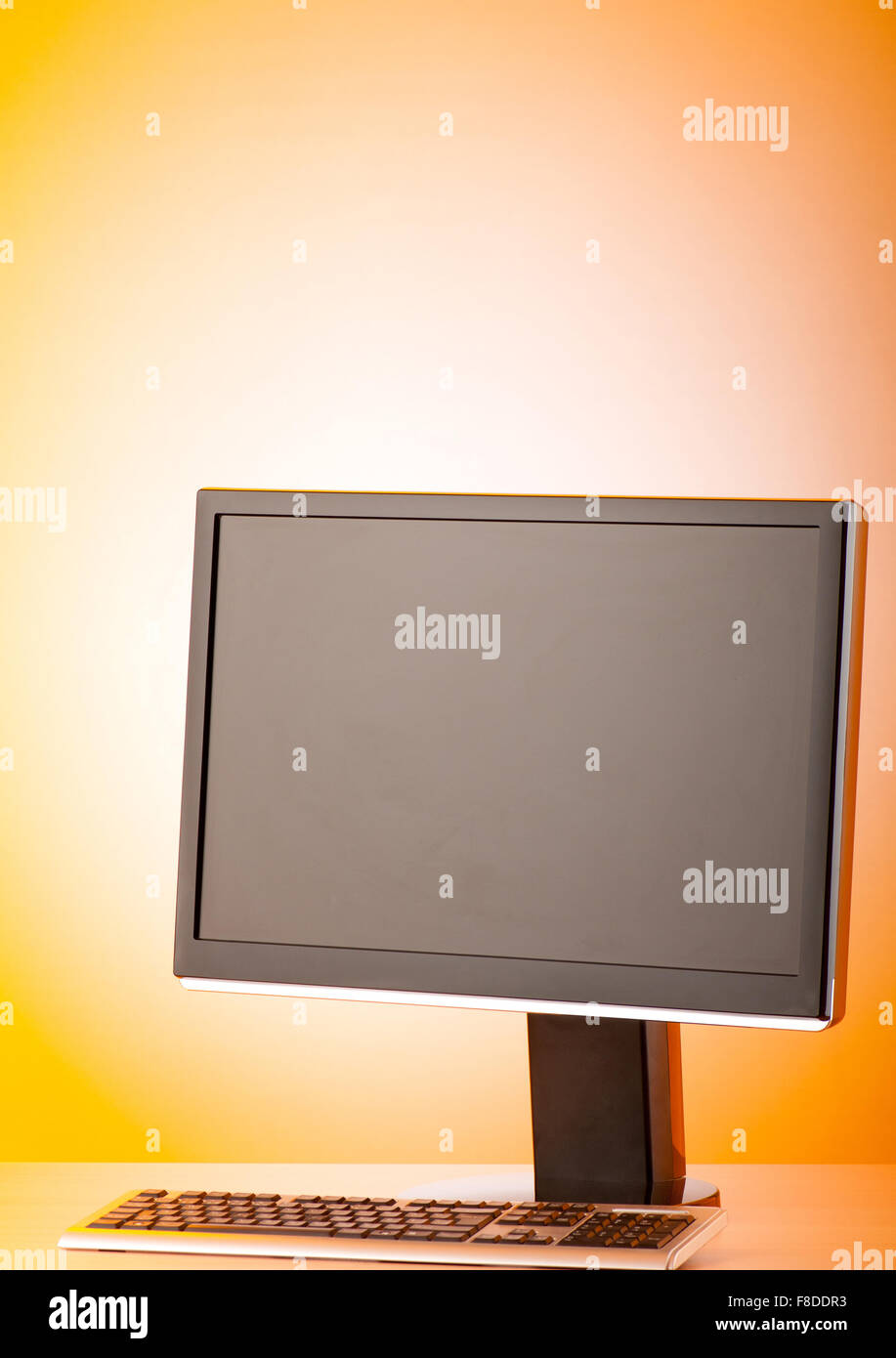 Wide screen computer monitor against colorful background Stock Photo ...