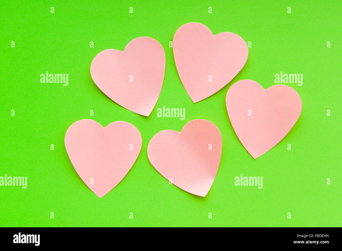Heart shaped sticky notes on the background Stock Photo - Alamy