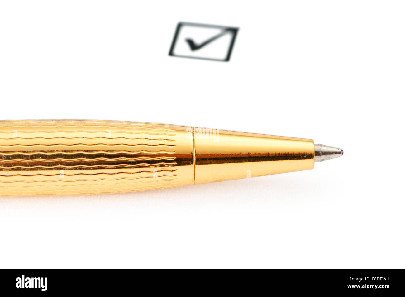 Tick box and pen isolated on white Stock Photo - Alamy