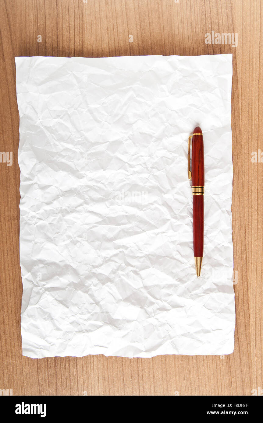 Paper background with pen Stock Photo - Alamy