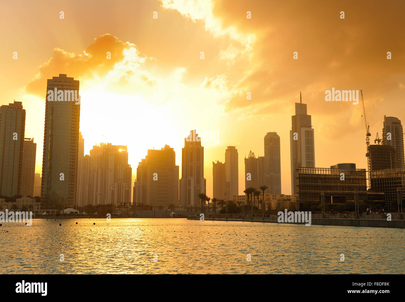 dubai city skyline at sunset conctruction and modern architecture ...