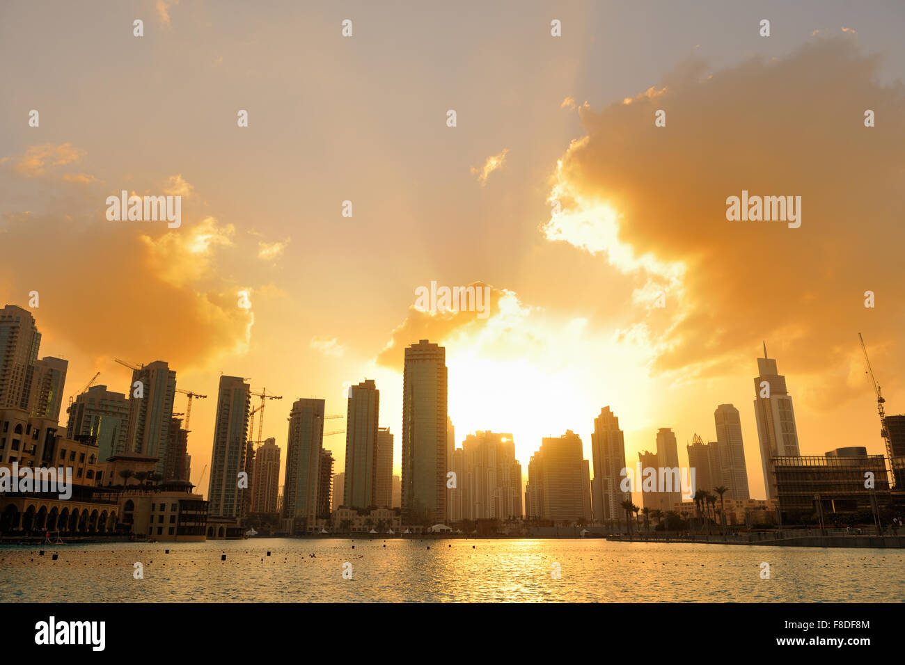 dubai city skyline at sunset conctruction and modern architecture ...