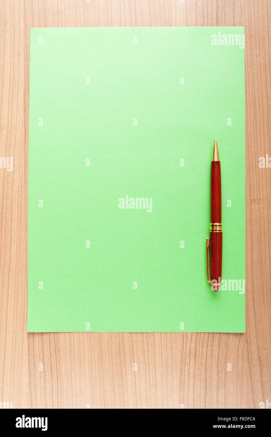 Paper background with pen Stock Photo - Alamy