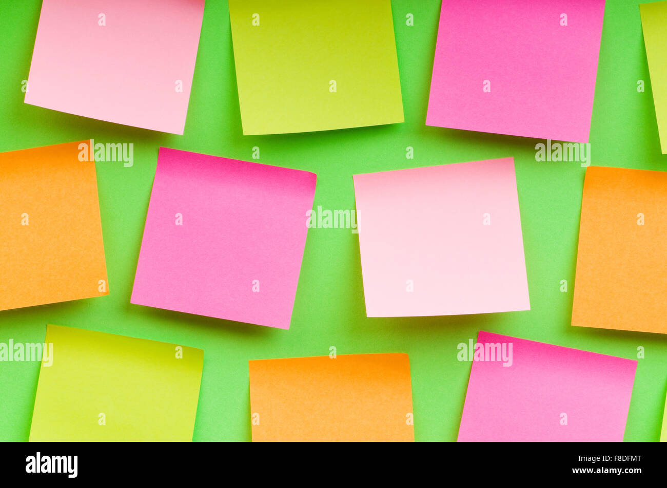 Reminder notes on the bright colorful paper Stock Photo - Alamy