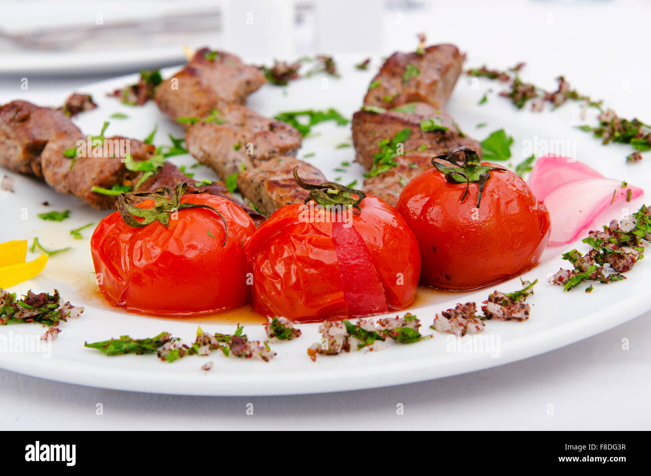 Meat kebab served in plate Stock Photo - Alamy