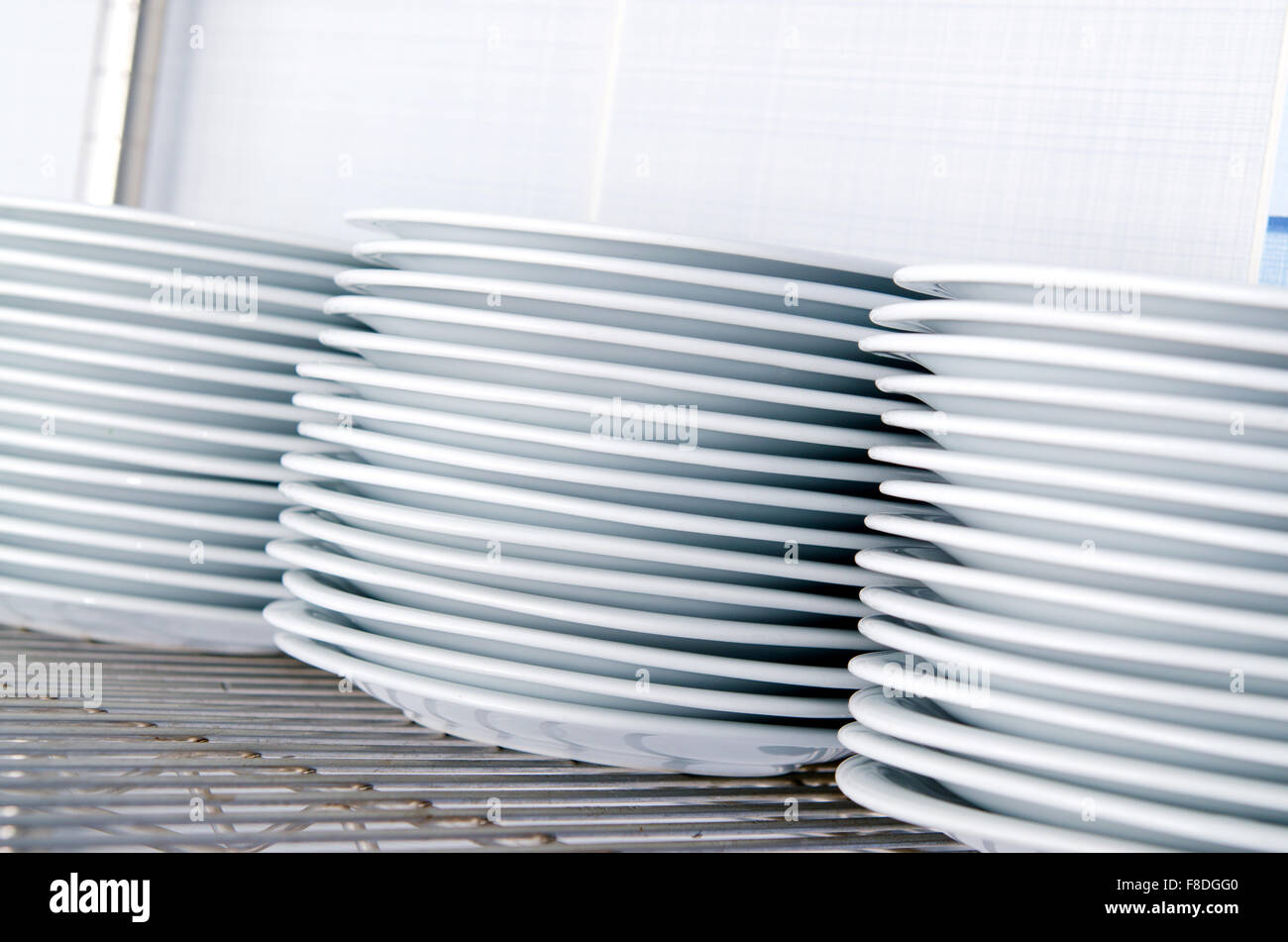 Many plates in the kitchen Stock Photo - Alamy
