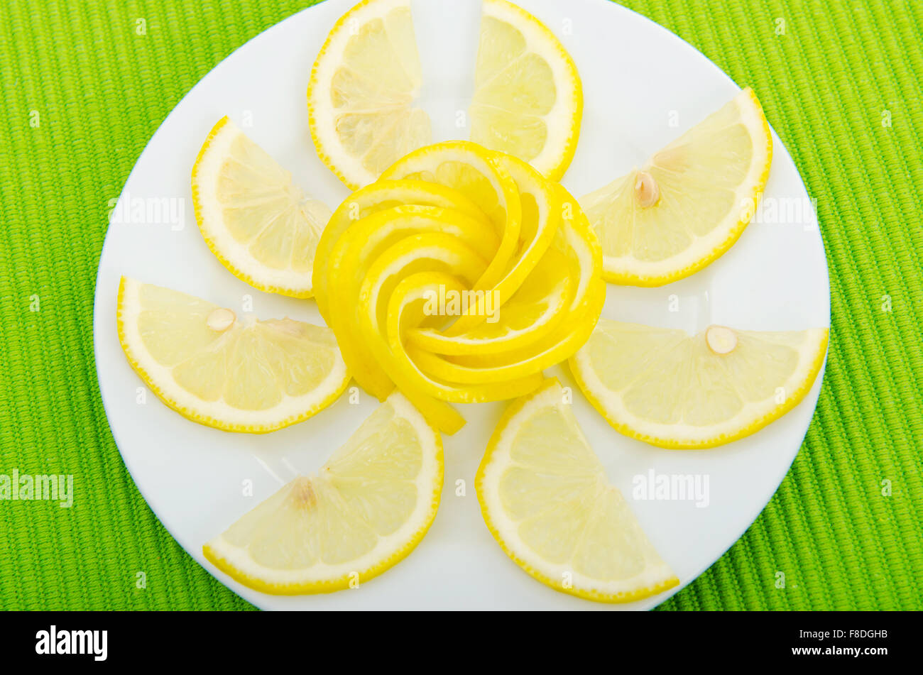 Lemon slices served in the plate Stock Photo - Alamy