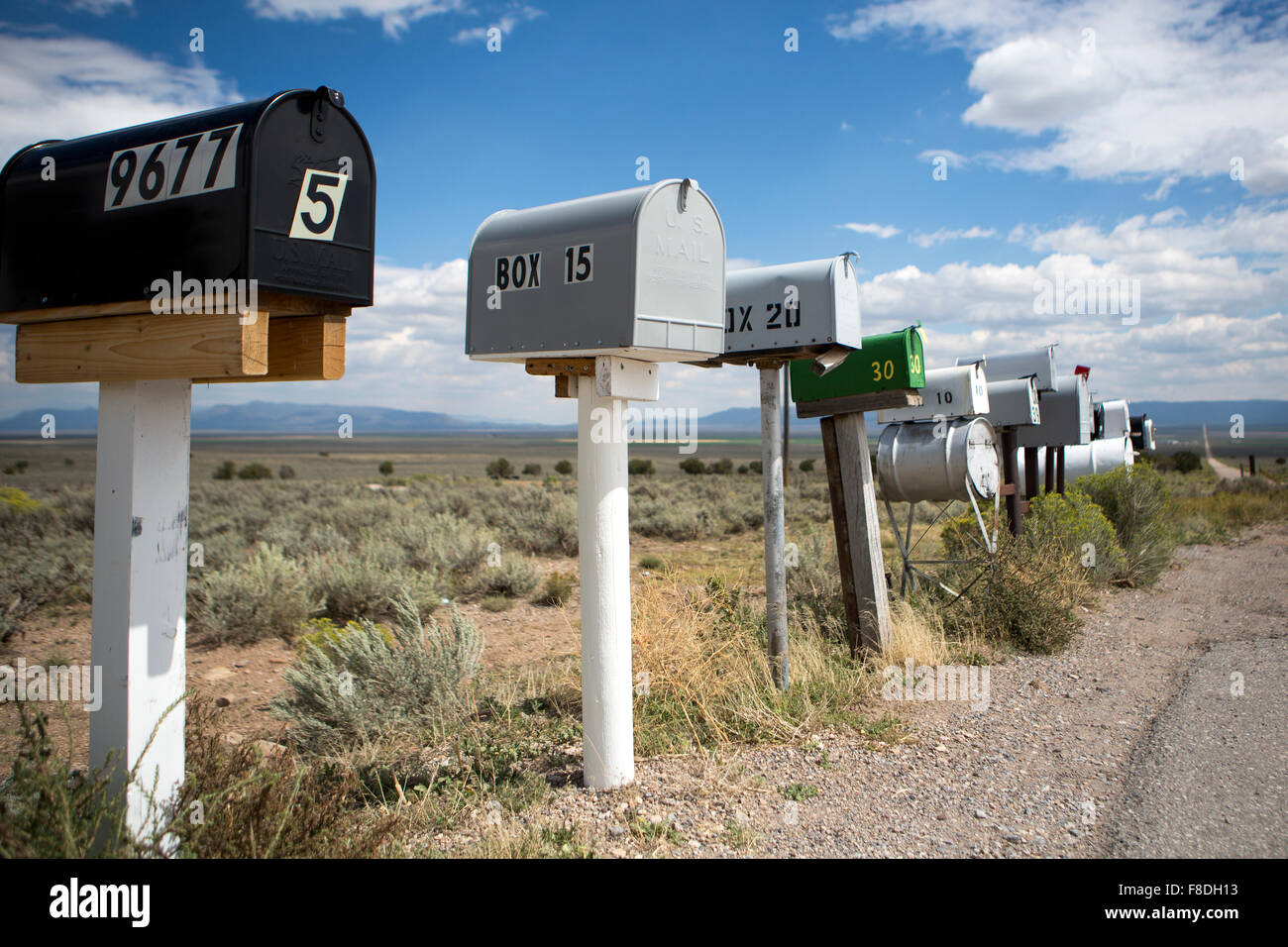 Vintage mailboxes in a row along the road in Arizona Stock Photo - Alamy