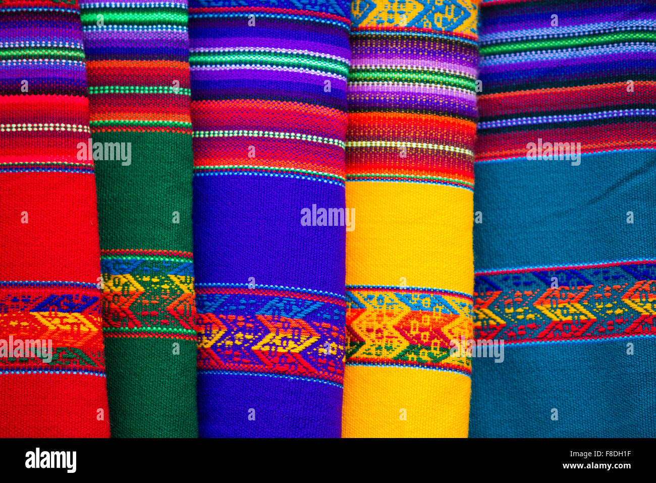 Background of colored fabrics from Bolivia ethnic market Stock Photo ...