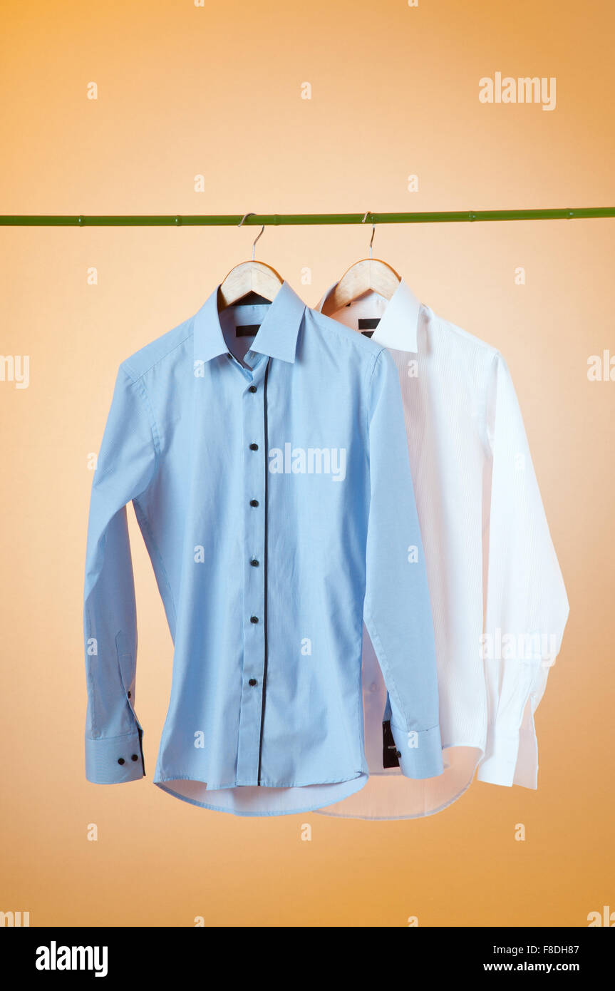 Shirt hanging on the hanger Stock Photo - Alamy