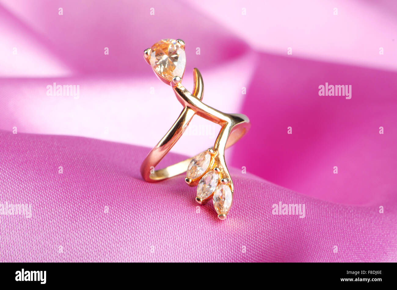 Fashion concept with ring on background Stock Photo - Alamy
