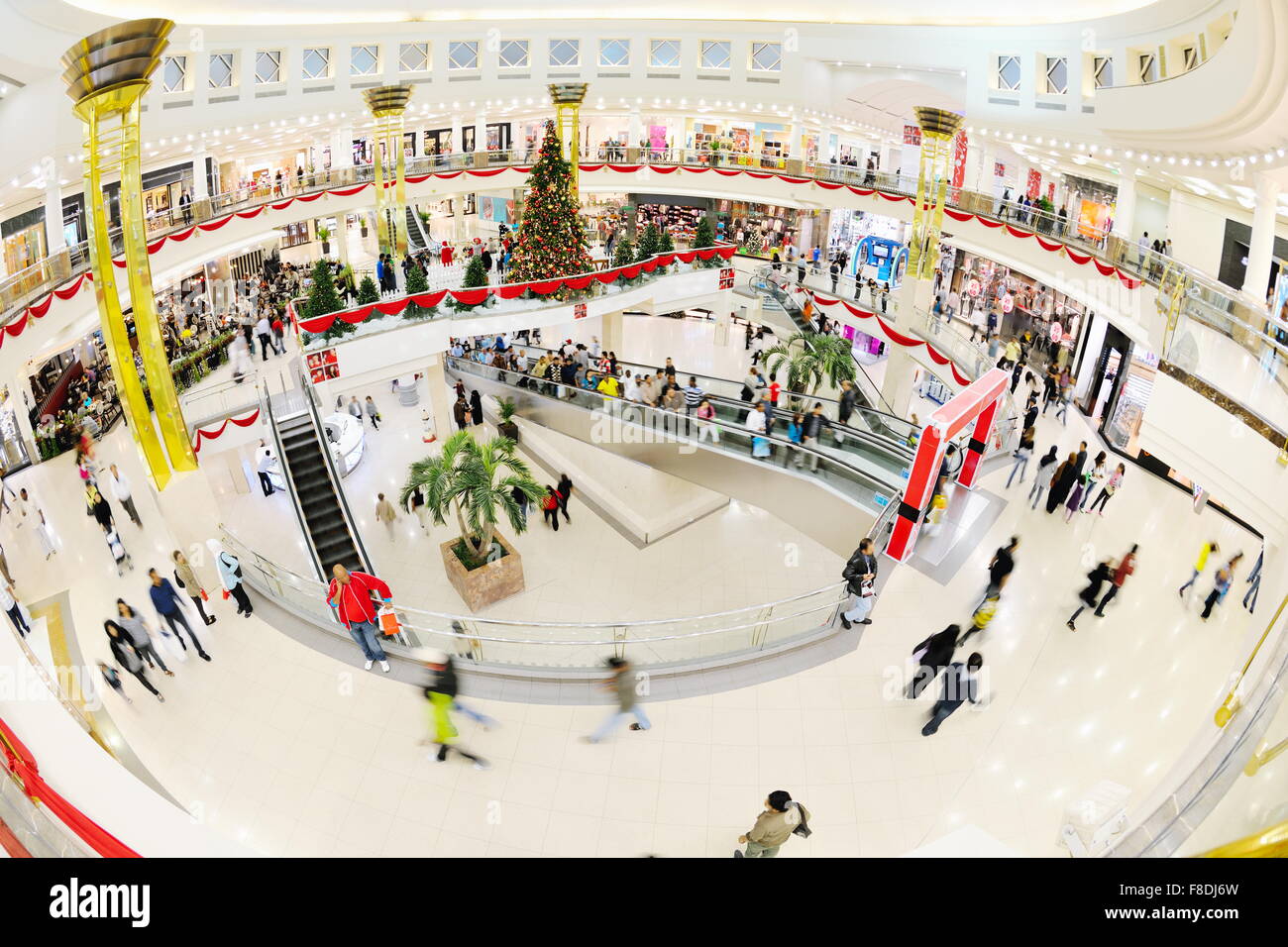 crowd shopper people in Interior of a modern shopping mall center Stock Photo - Alamy