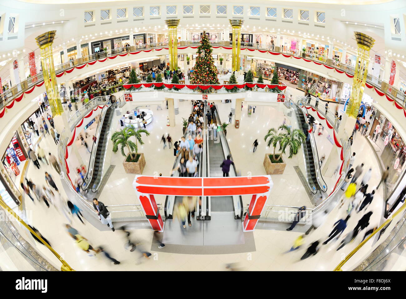 crowd shopper people in Interior of a modern shopping mall center Stock Photo - Alamy