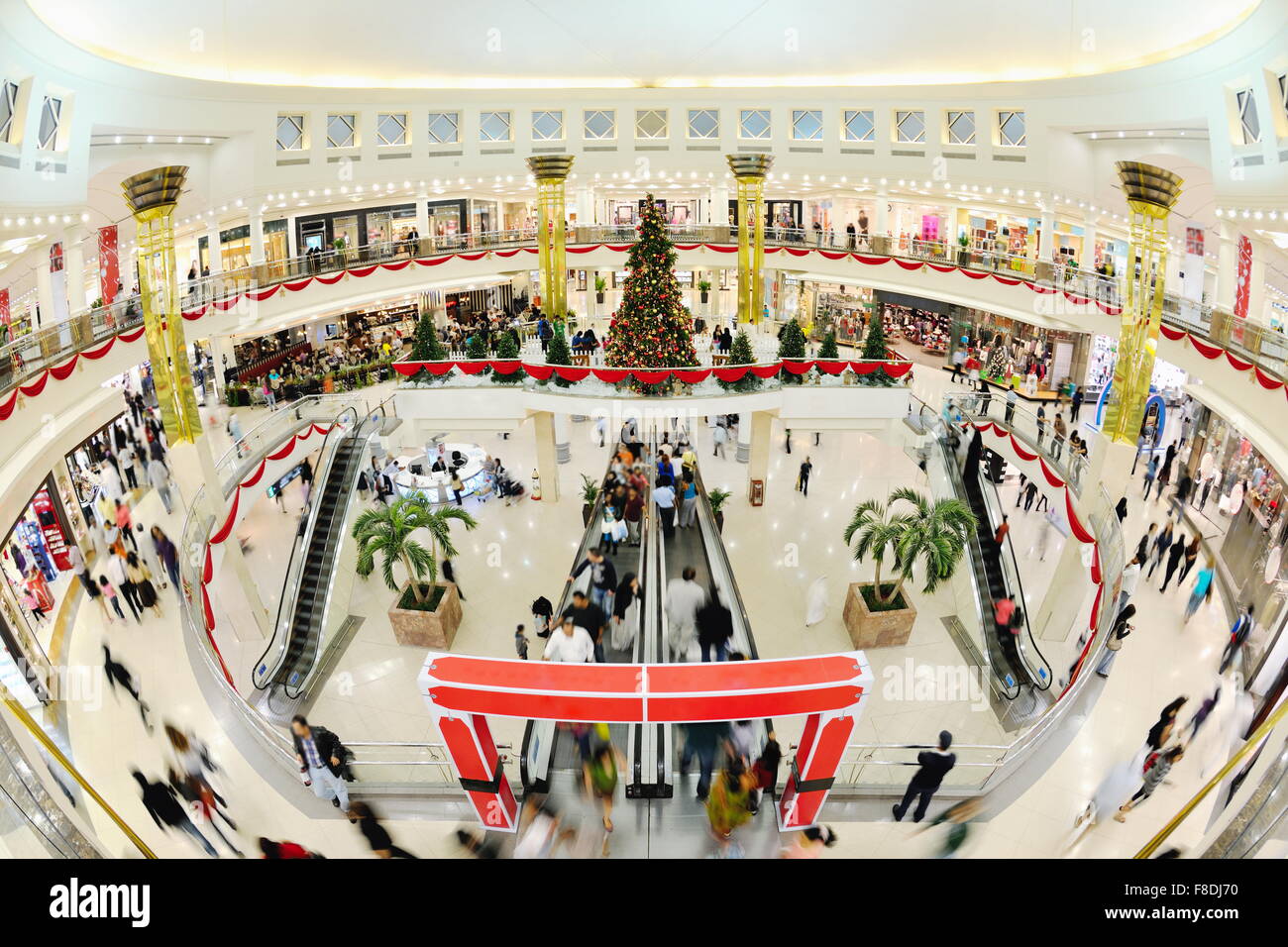 crowd shopper people in Interior of a modern shopping mall center Stock Photo - Alamy